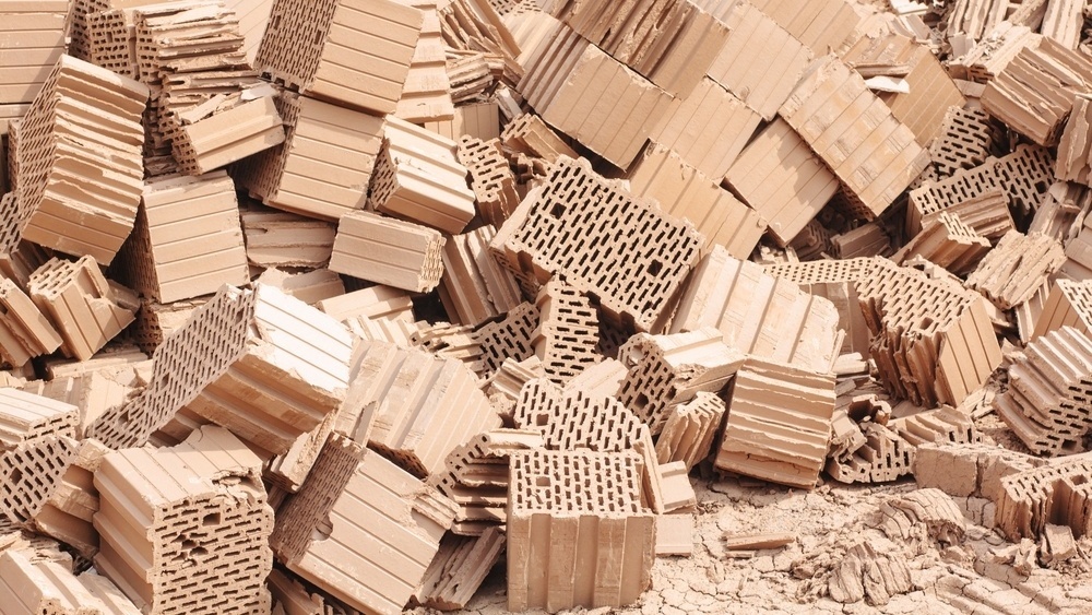 How to reduce waste material during brick production?